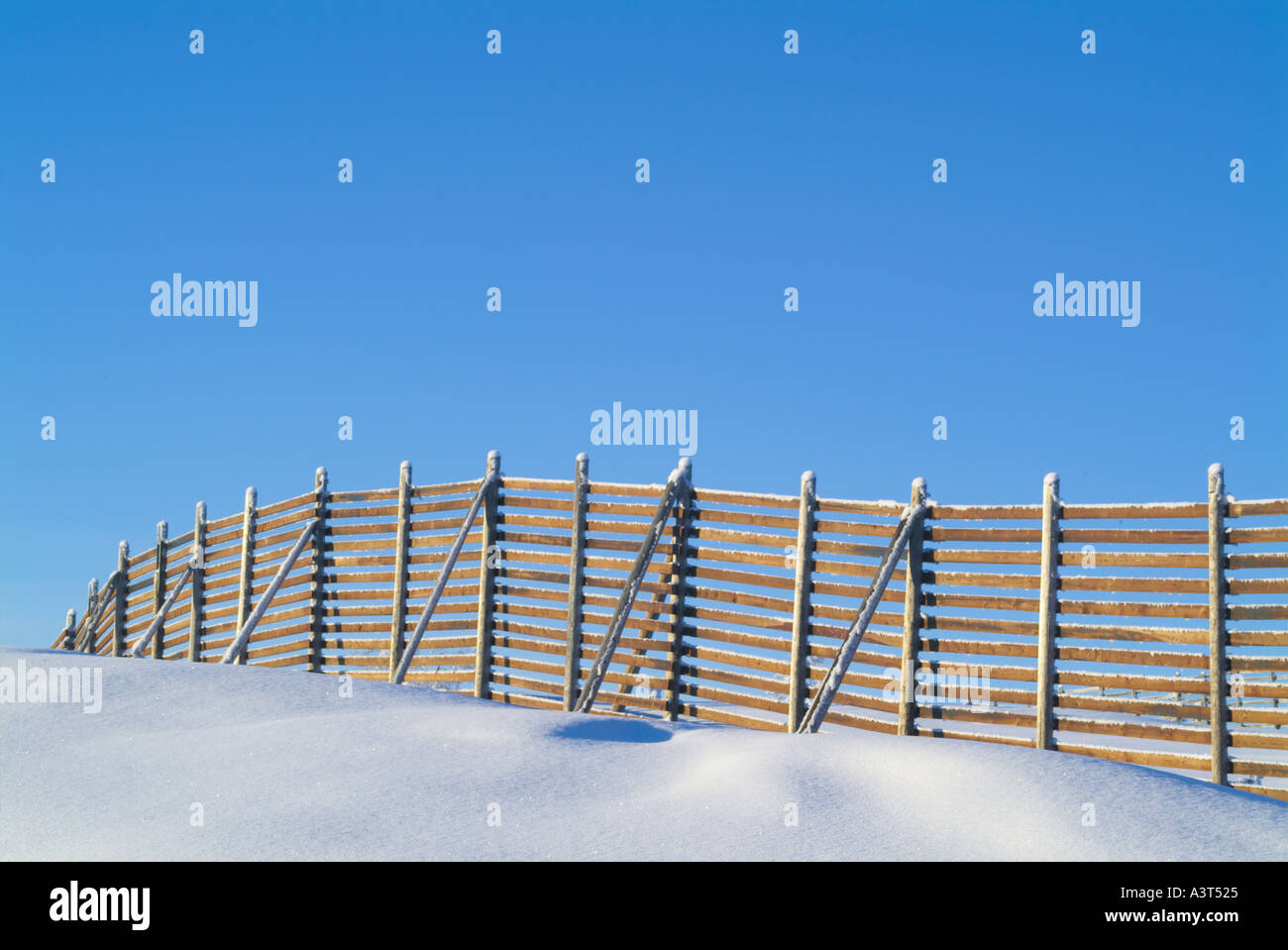 Roadfence for snowprotection Stock Photo - Alamy