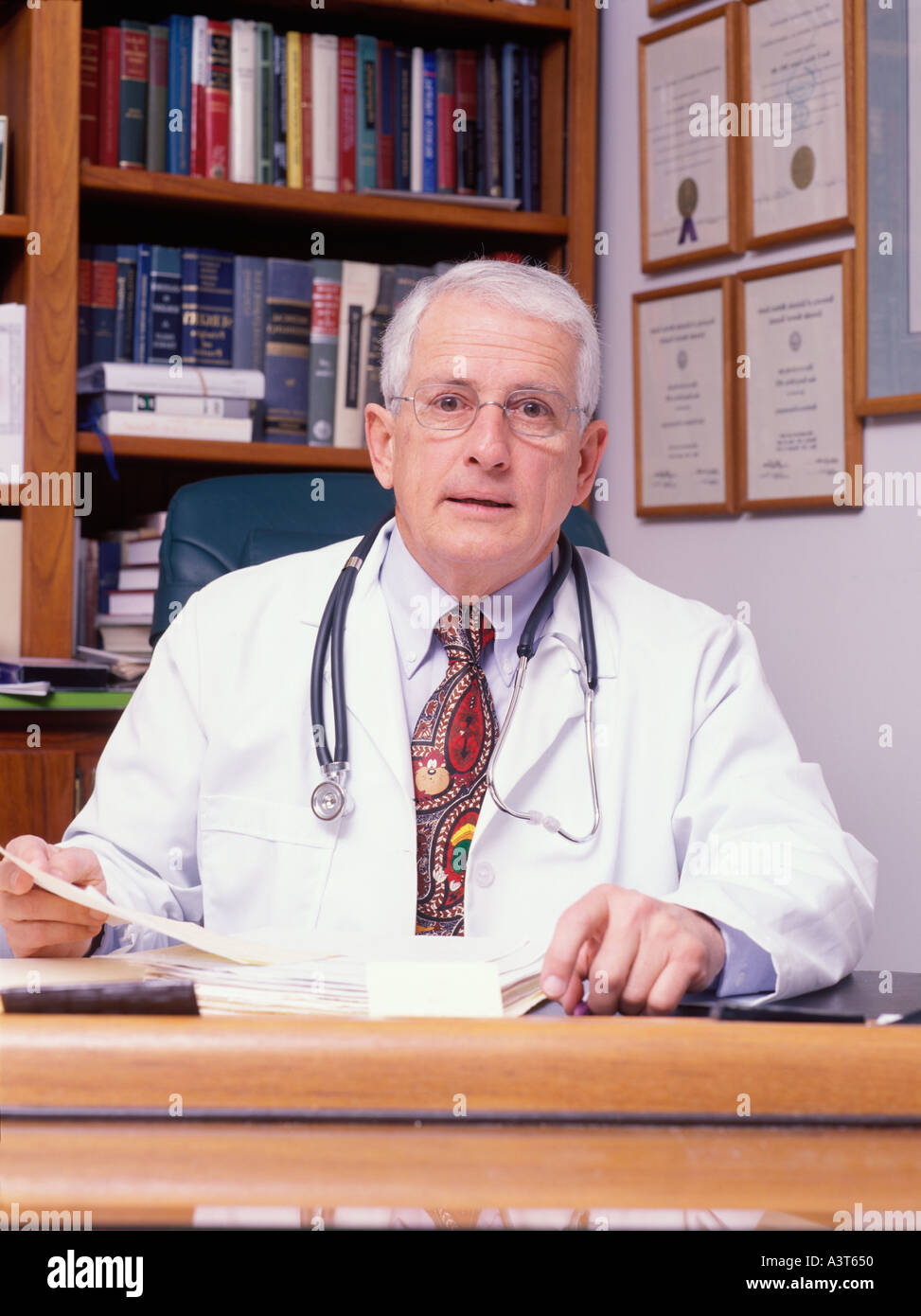 medical doctor at his desk Stock Photo - Alamy