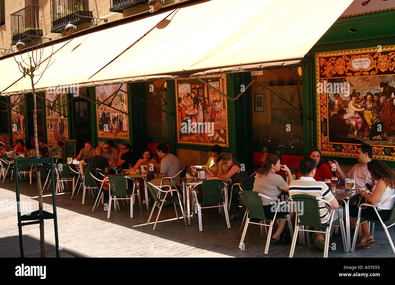 Street cafe bar and diners Madrid Spain EU Europe Stock Photo - Alamy