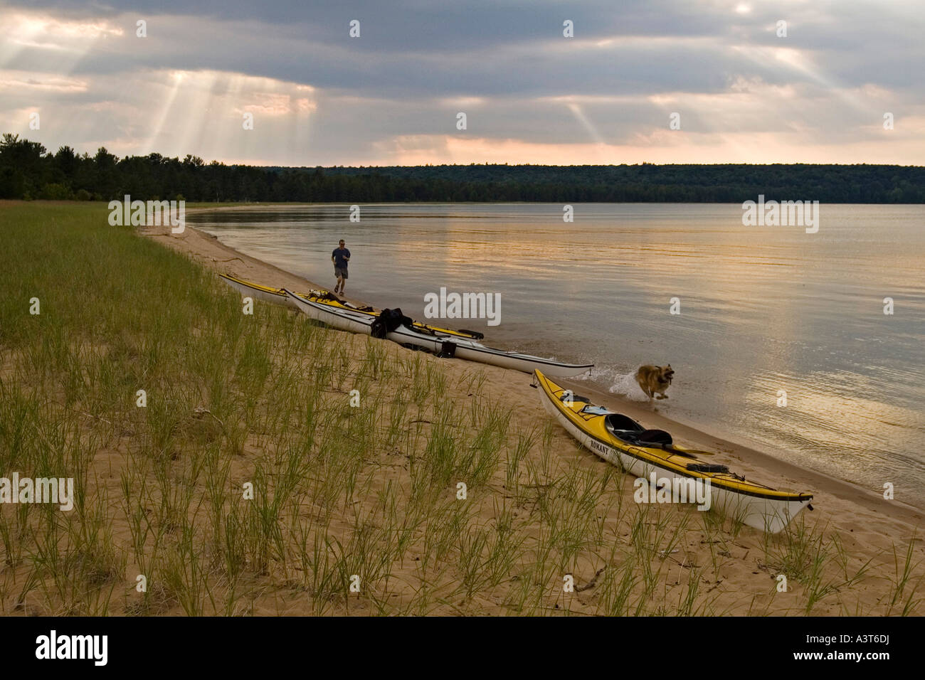A group of sea kayaks on Trout Bay beach on Grand Island National ...