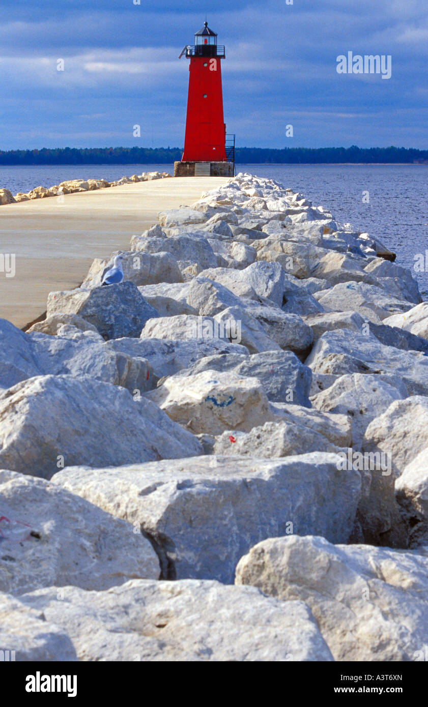THE MANISTIQUE LIGHTHOUSE AND BREAKWATER AT THE MOUTH OF THE MANISTIQUE ...