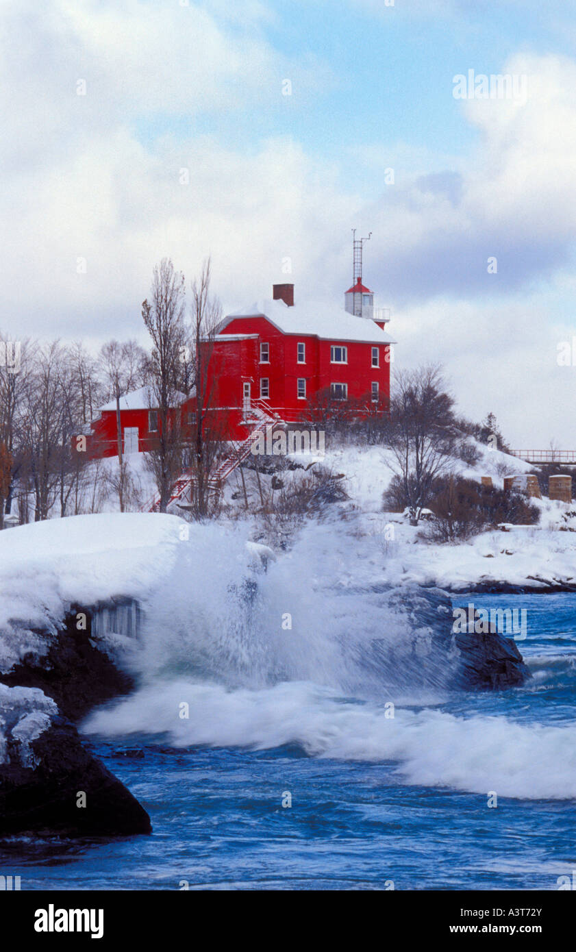 THE MARQUETTE LIGHTHOUSE DURING A LAKE EFFECT SNOW STORM ON LAKE ...