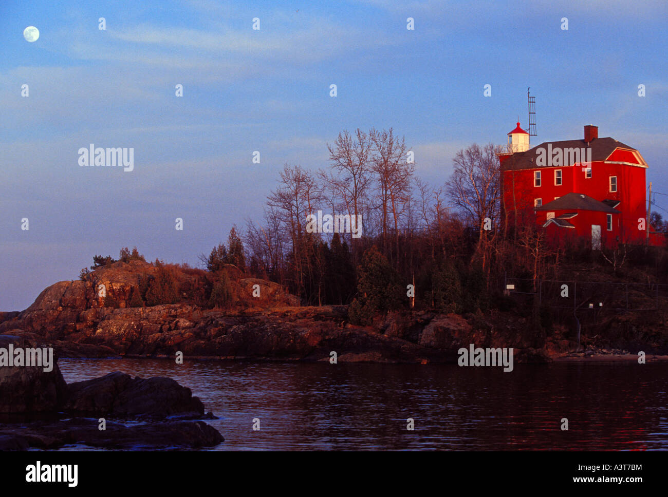 MARQUETTE LIGHTHOUSE ON LAKE SUPERIOR WITH FULL MOON IN MARQUETTE ...