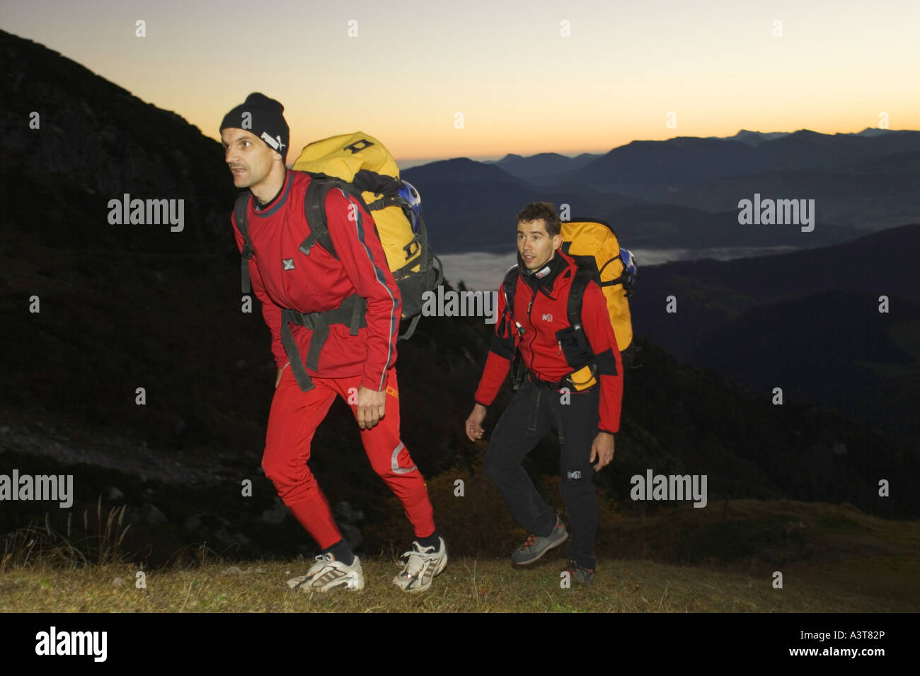 two men mountain hiking Stock Photo - Alamy