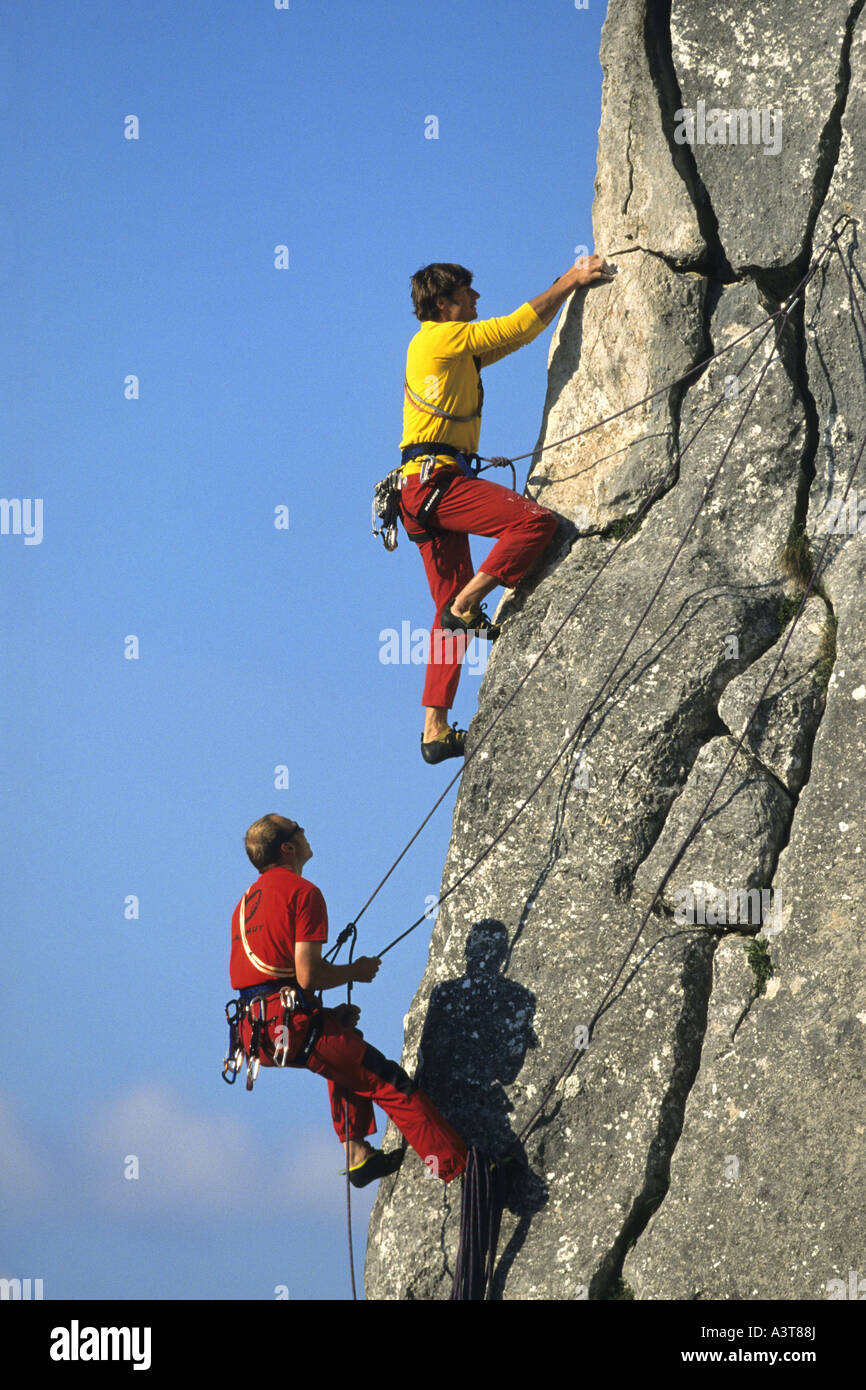 climbergs at a rock wall Stock Photo - Alamy