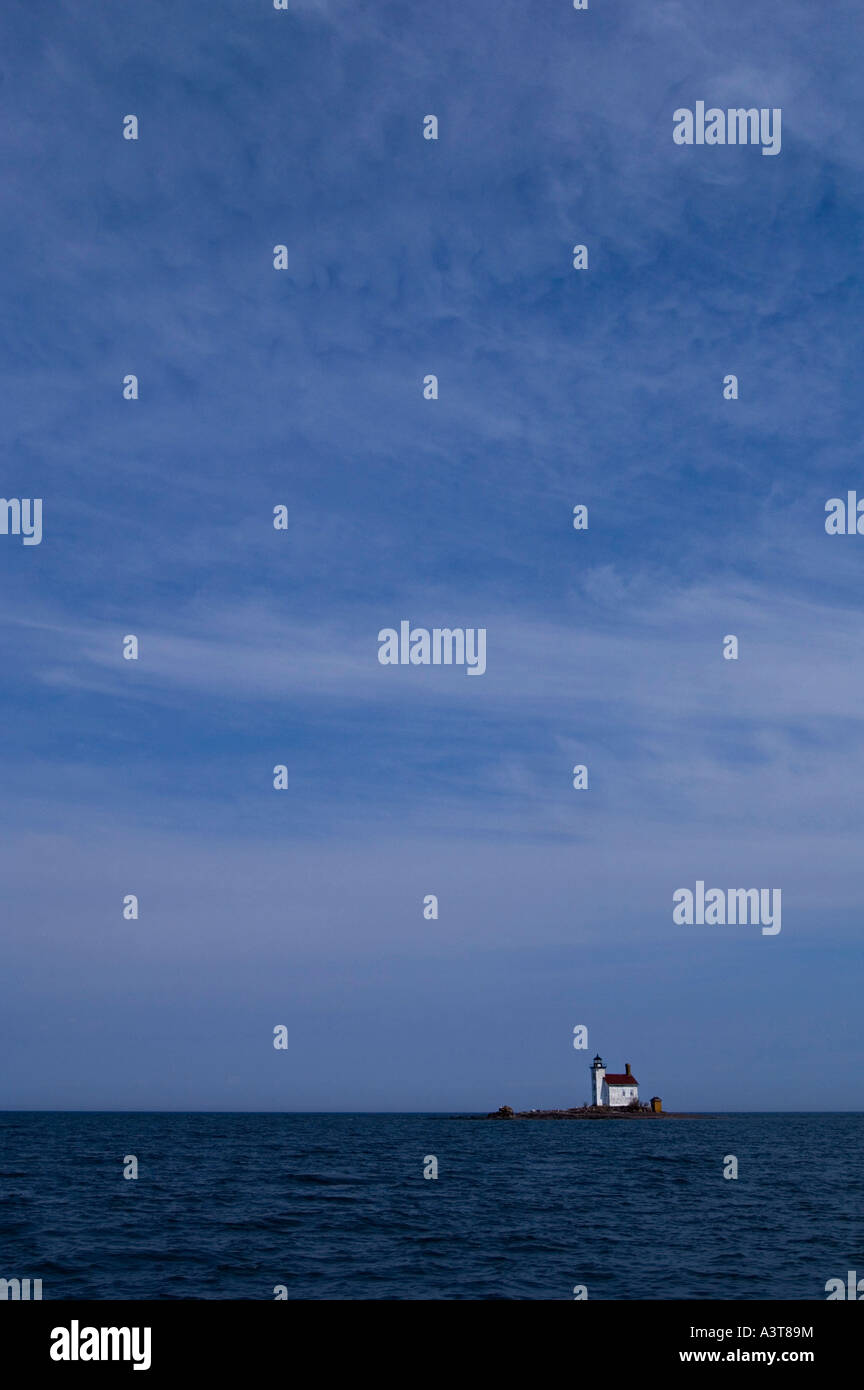 Gull Rock Lighthouse is a speck on the horizon of Lake Superior near ...
