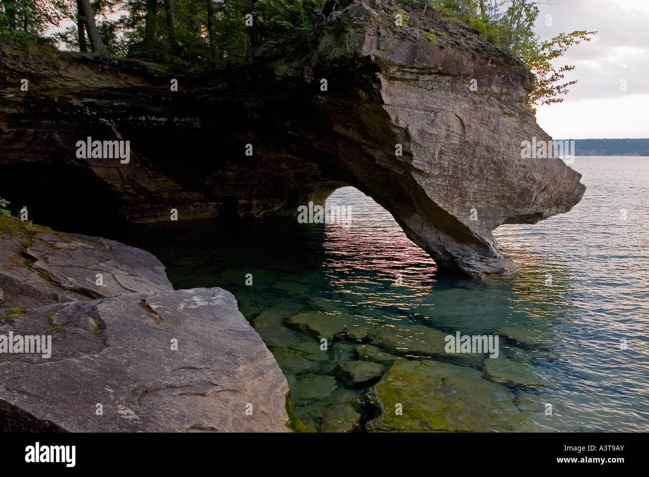 Arch and sea cave near Trout Point on Grand Island National Recreation ...