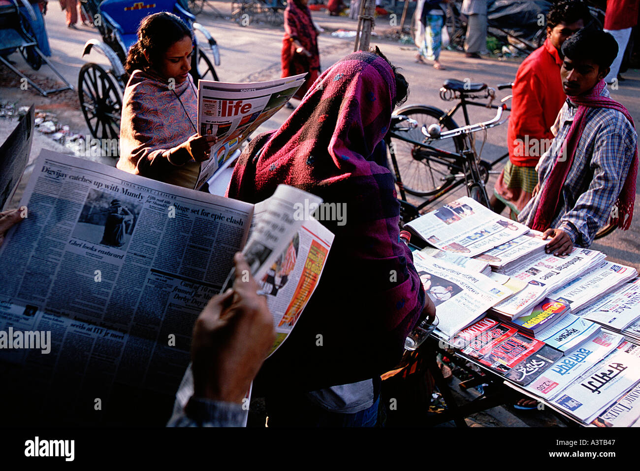 Newspaper stall in Kolkata Calcutta India Roadside newspaper reading ...