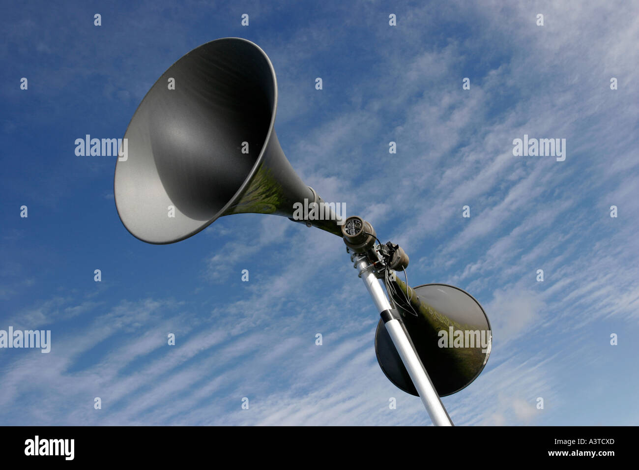 Public address system loudspeakers against a blue sky Stock Photo - Alamy