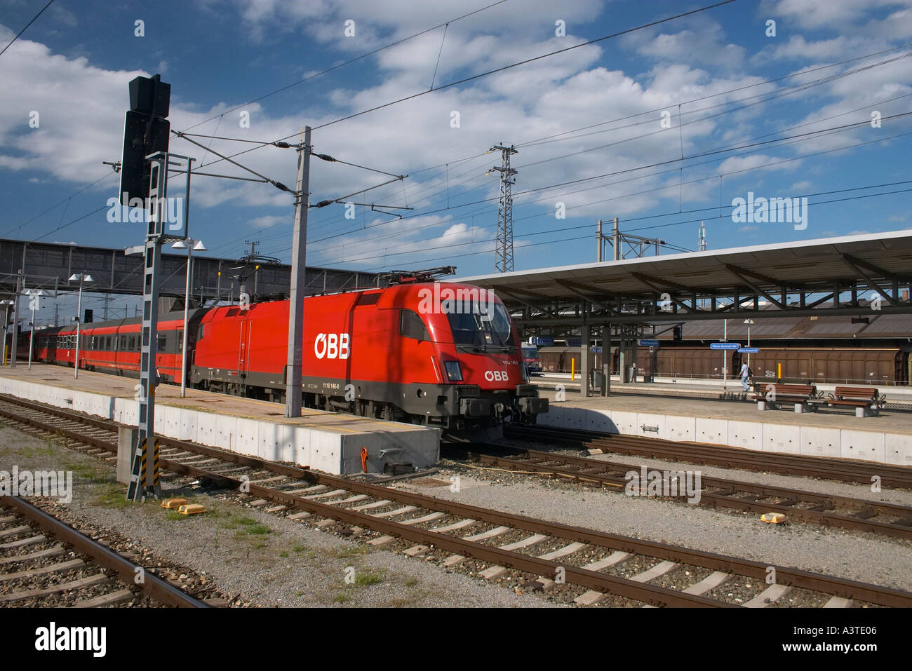 red locomotive in train station Stock Photo - Alamy