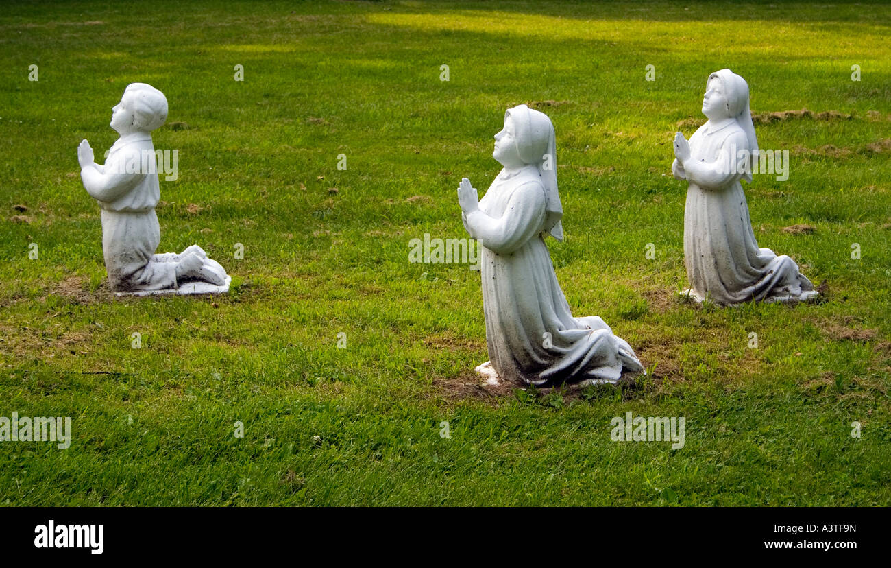 Praying children statues at the Shrine of Our Lady Of Martyrs in ...
