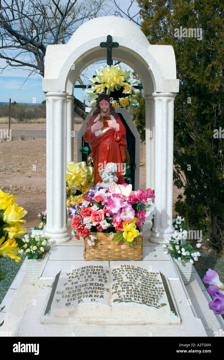 Jesus statue at a grave at the old Mexican cemetery in Tubac Arizona ...