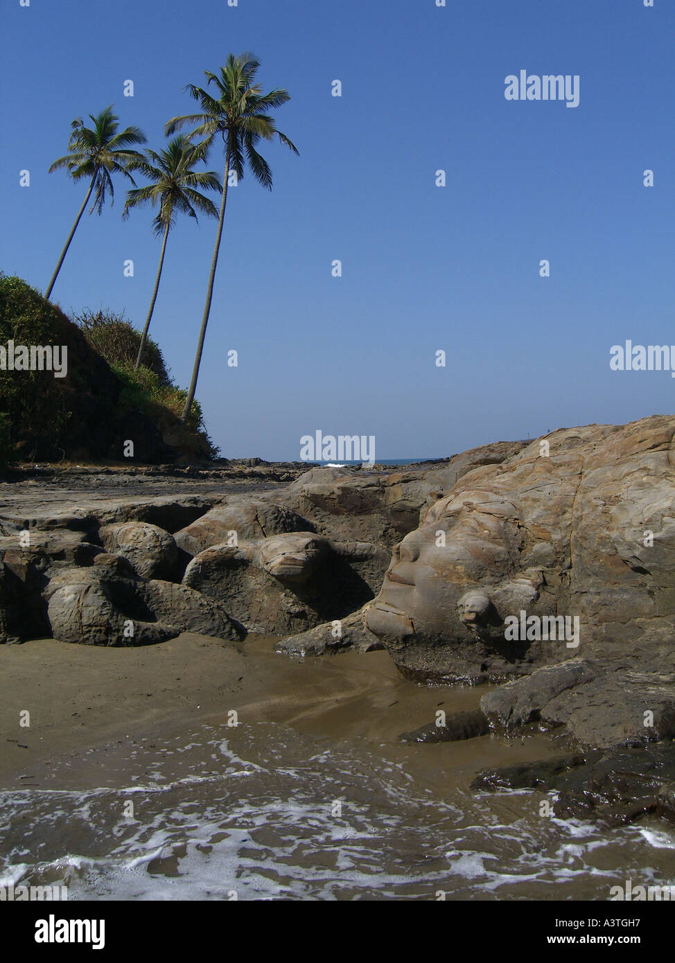 The Shiva sculpture on the rock, in small Vagator beach (State of Goa ...