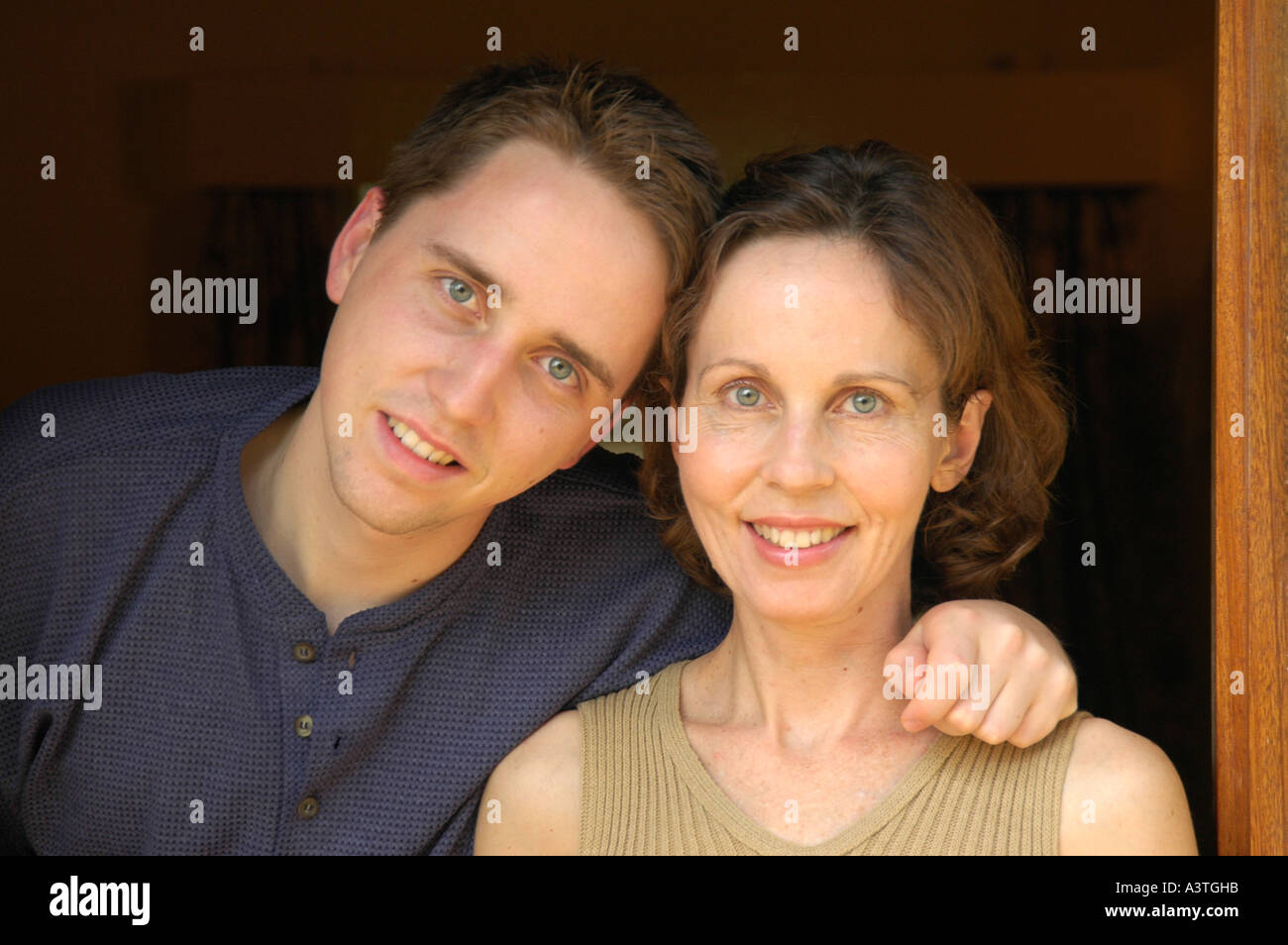 45 Year Old Mother Enjoying A Moment With Her 21 Year Old Son Stock