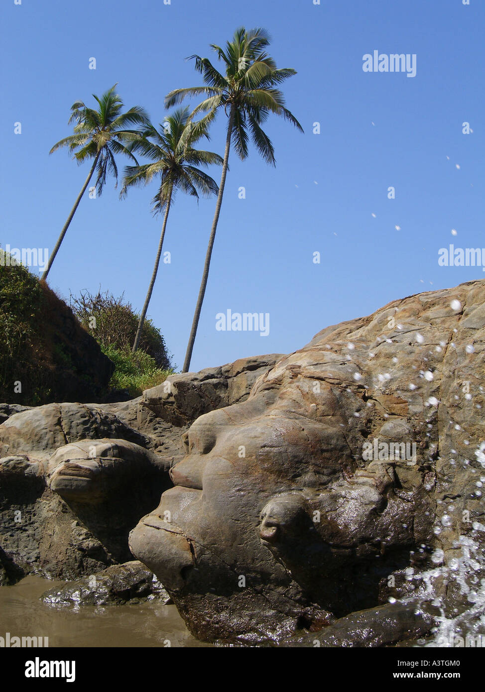 The Shiva sculpture on the rock, in small Vagator beach (State of Goa ...