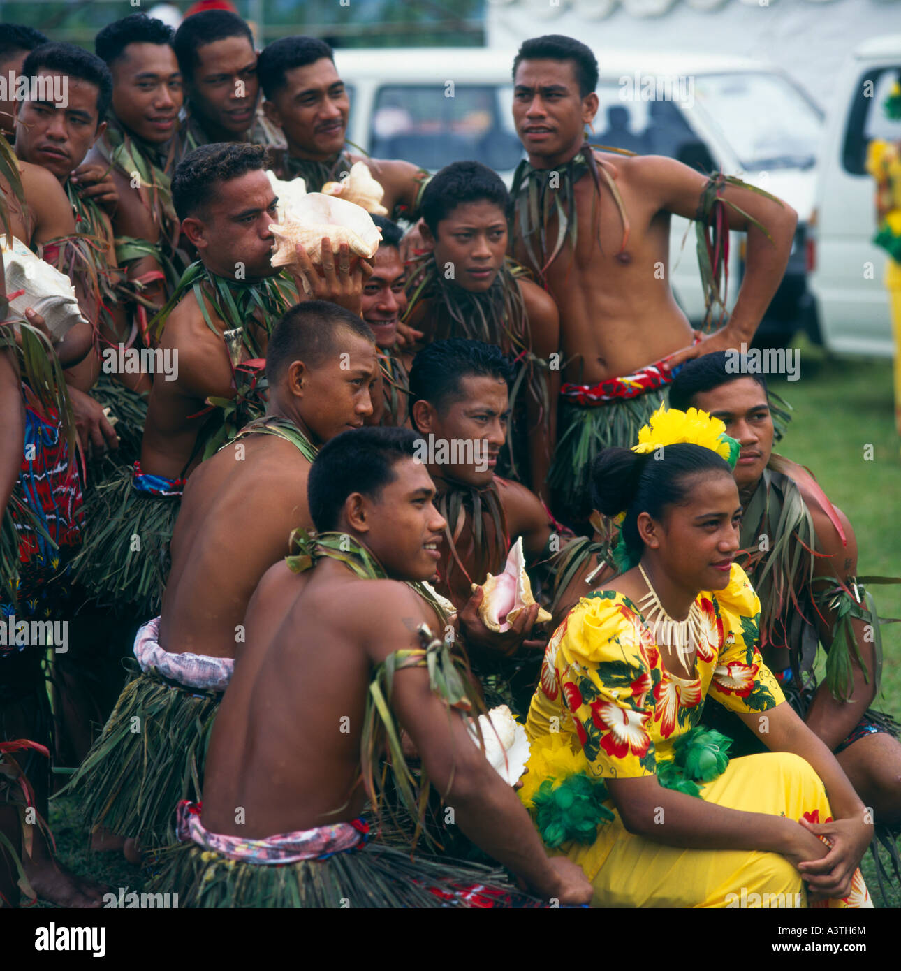 Local dance group of young men and girl in yellow dress at the Festival ...