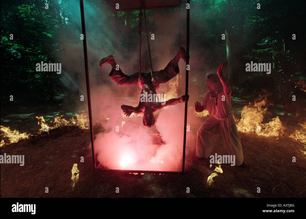 Actor suspended over a fire as part of Javanese mythology play inspired ...