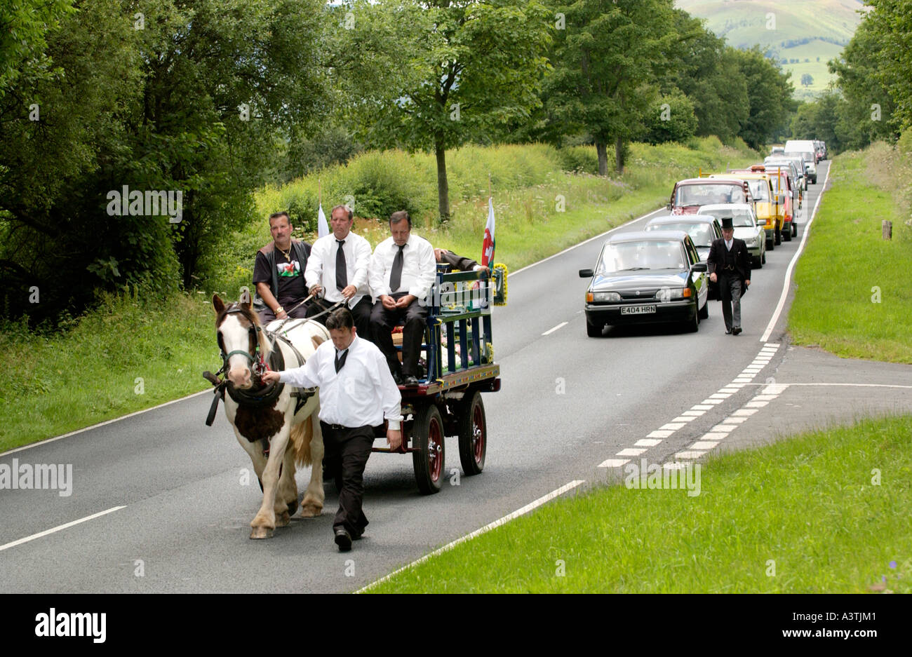 Gypsy funeral cortege using horse and cart to carry the coffin at ...