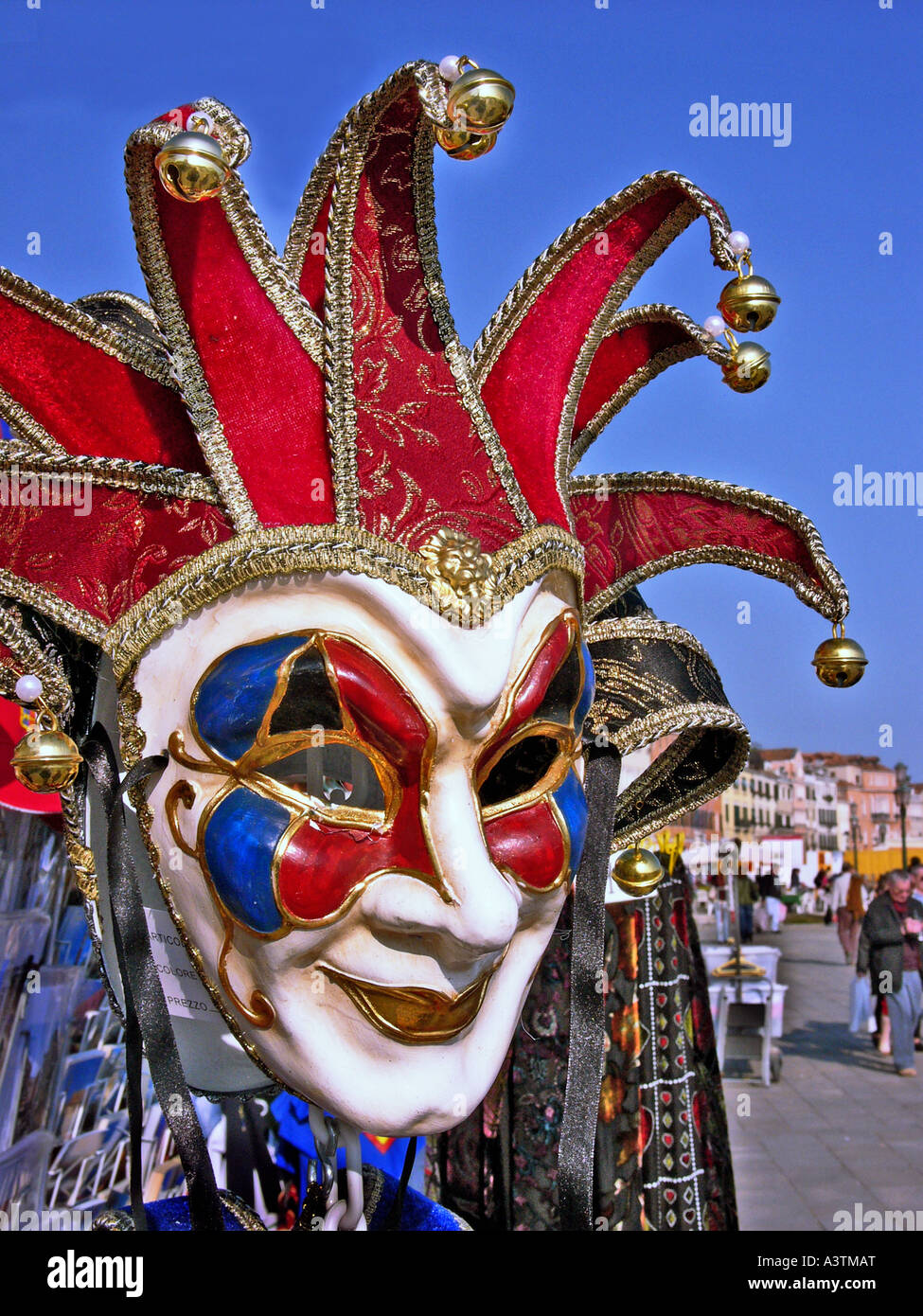 Venetian mask in close up for sale on the quayside in Venice Italy ...