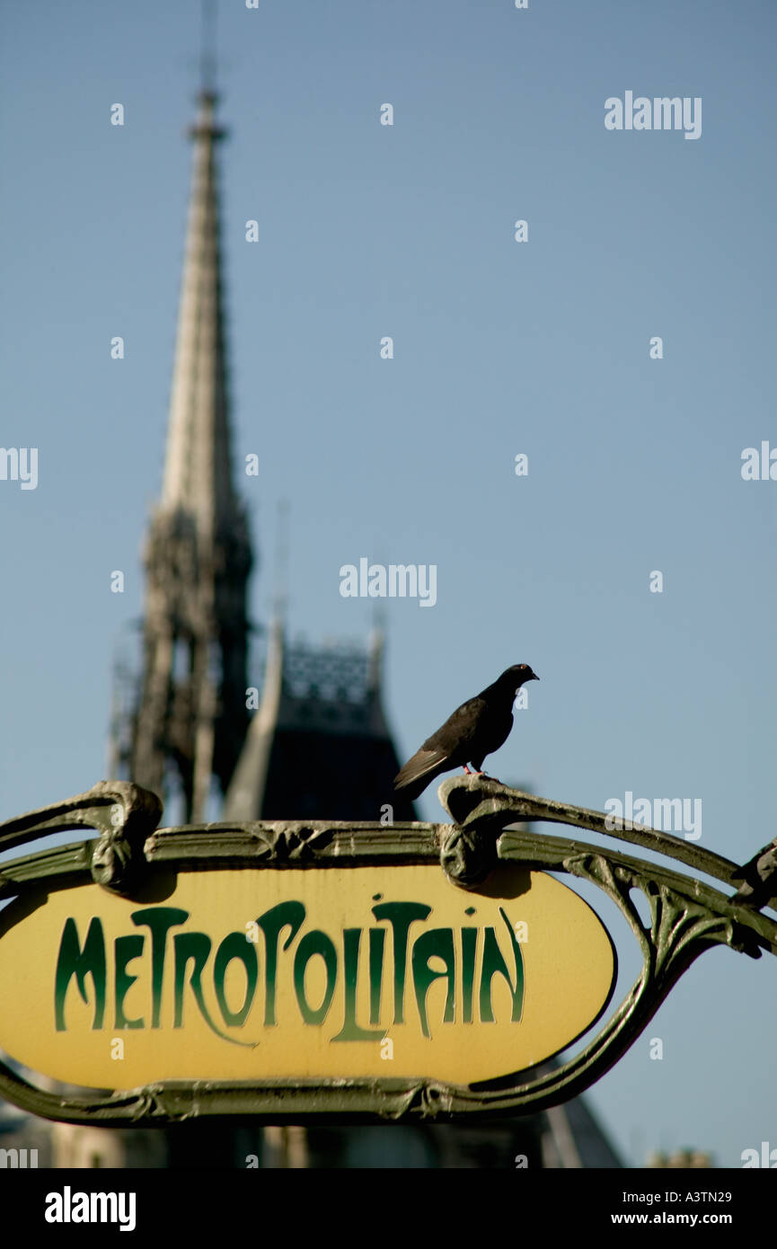 Metro entrance sign spire of La Sainte Chapelle Palais de Justice Paris ...