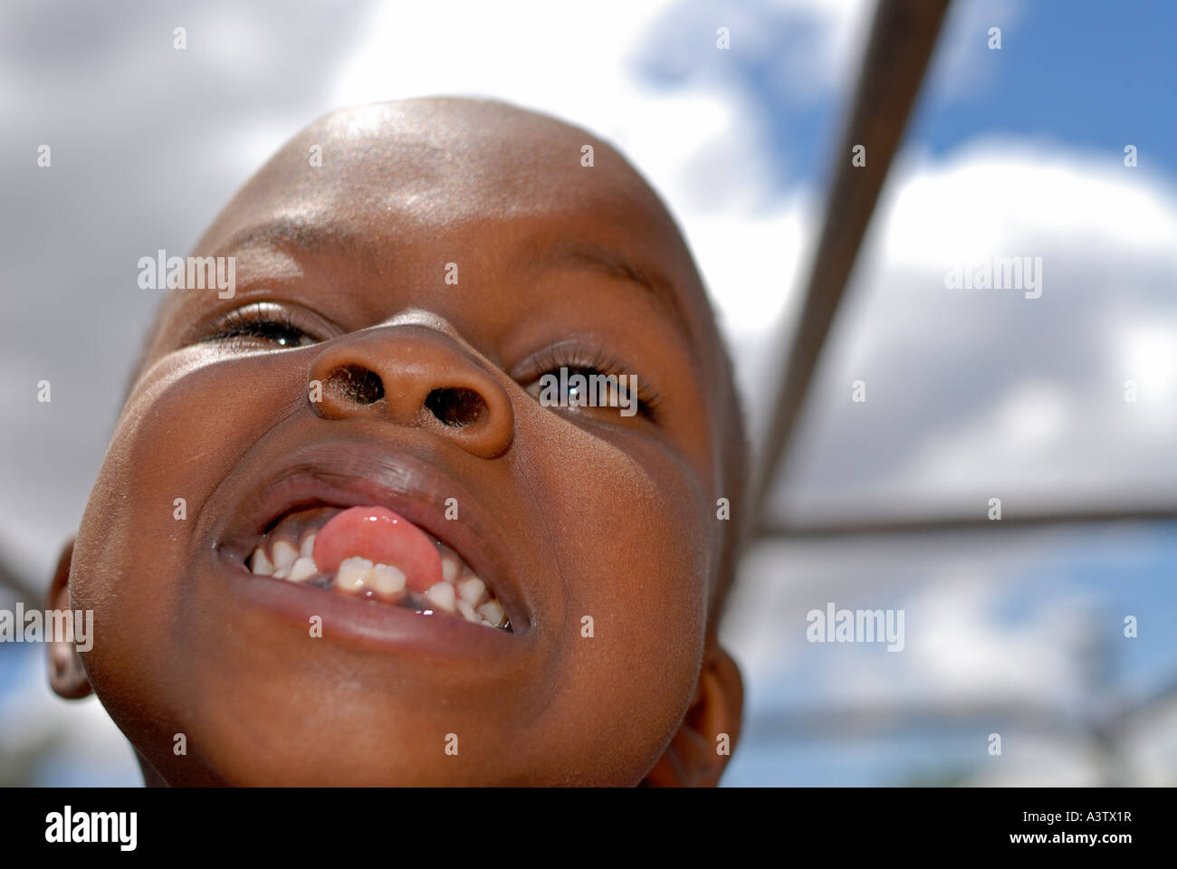 Toothless Kenyan boy sticking out his tongue Maralal Northern Kenya ...
