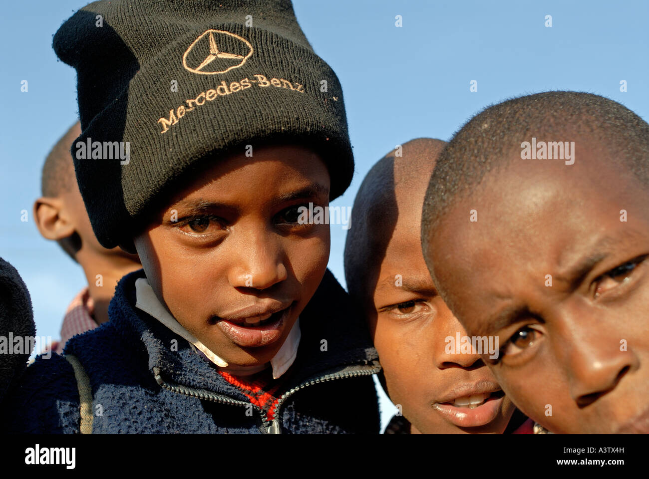 Kenyan boys with Mercedes Benz hat in Nyahururu Kenya Stock Photo - Alamy