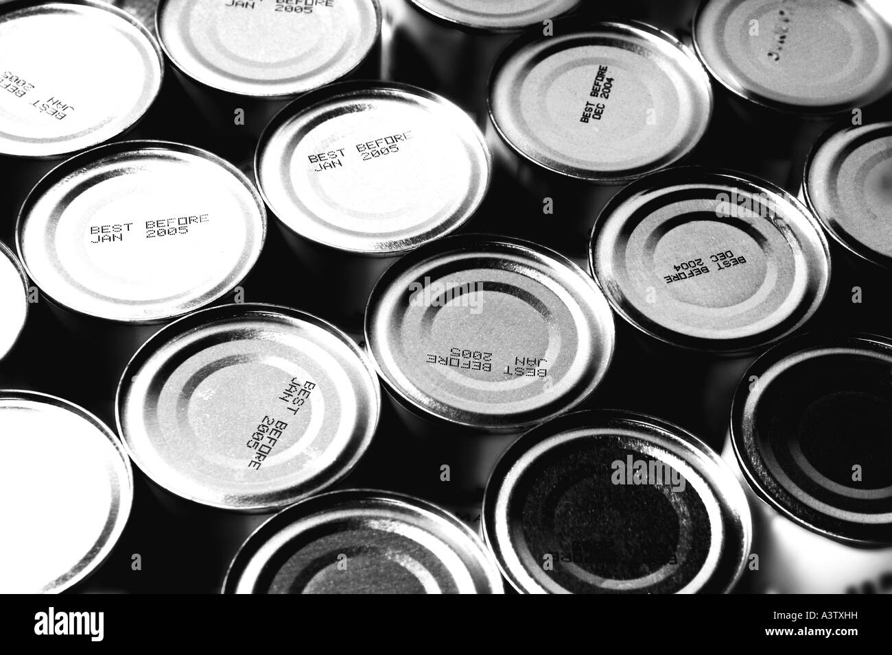 Canned food with sell by dates Tins Cans in multiples Black and White ...