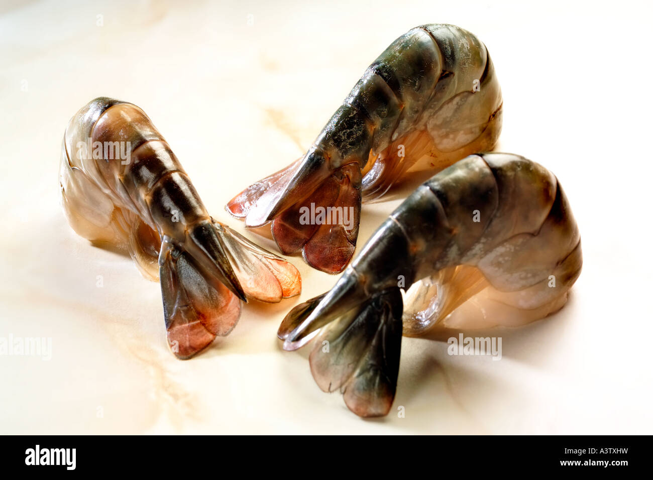 King Prawn Tails Raw Uncooked in shell from Bangladesh Stock Photo - Alamy