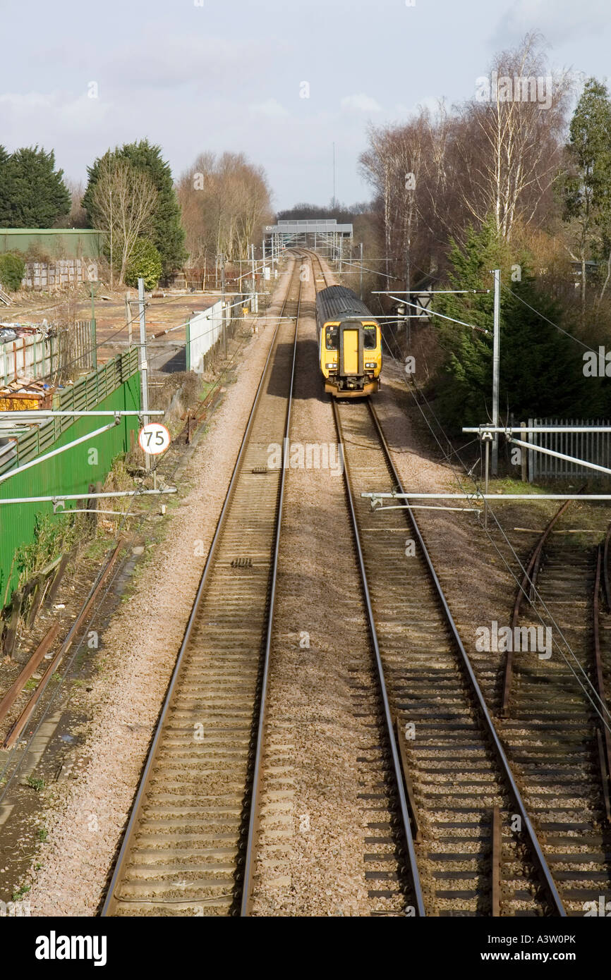 A straight section of overhead powered railway including a small ...