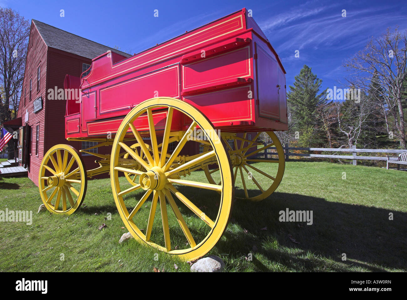 Red Wagon and barn Old red wagon set against old red barn and blue sky ...