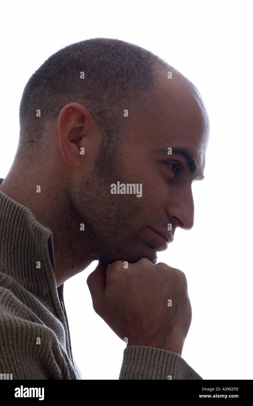 thoughtful young man Stock Photo - Alamy