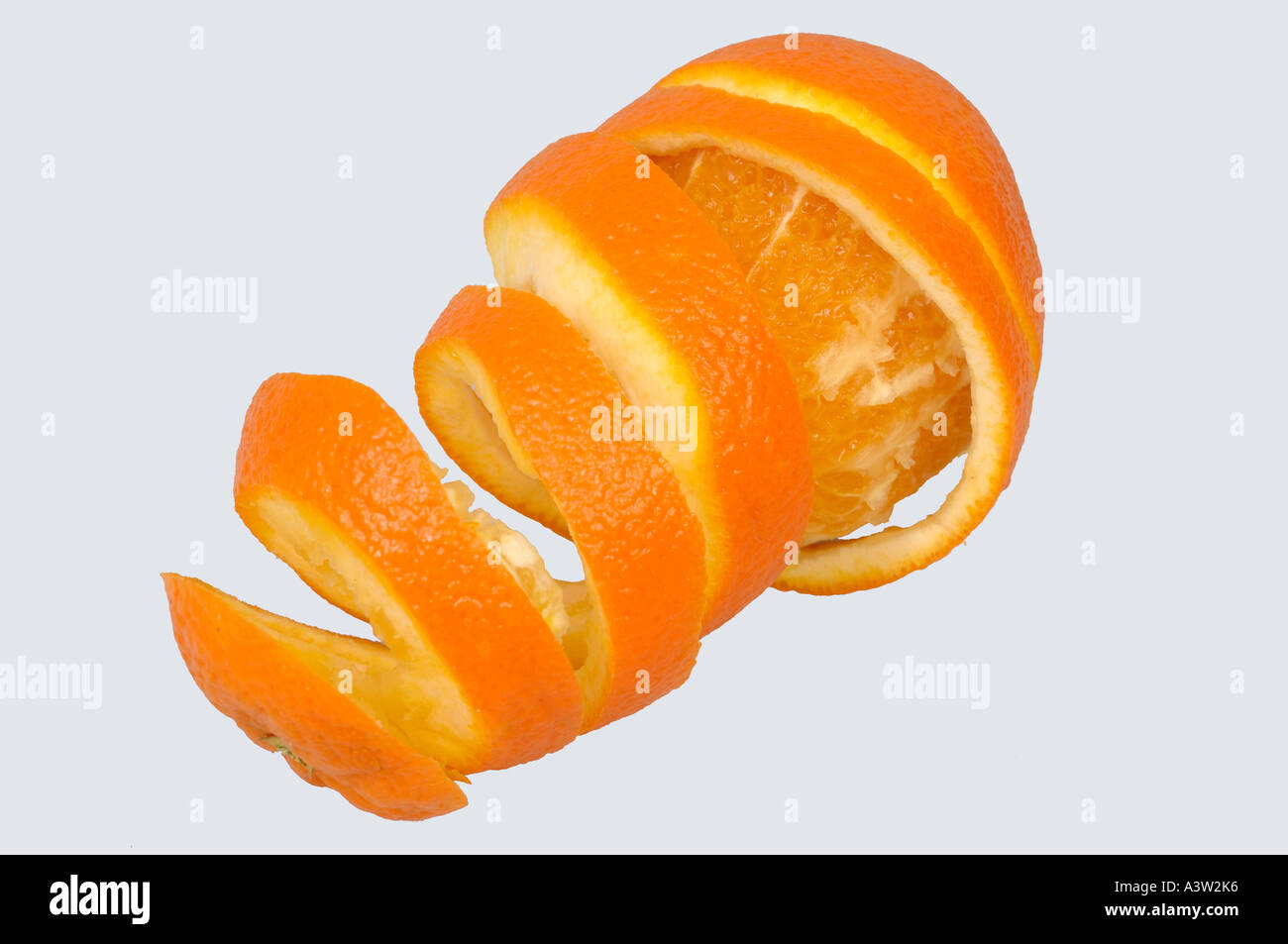 Harvested navel orange fruit with peel partially cut in a spiral Stock ...