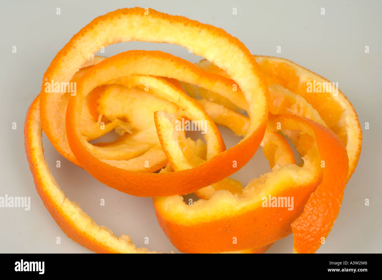 Orange fruit peel partially Stock Photo - Alamy