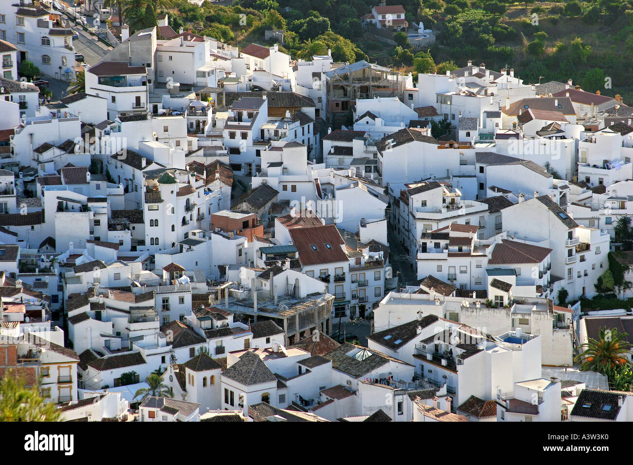 Pretty hillside town of Ojen near Marbella in Spain showing compact and ...