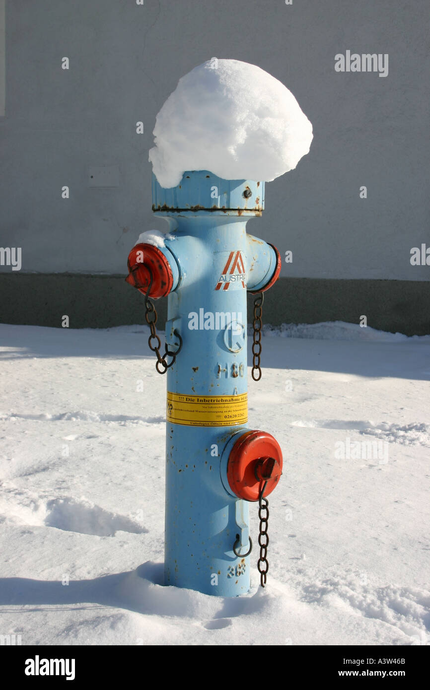hydrant capped with snow Stock Photo - Alamy