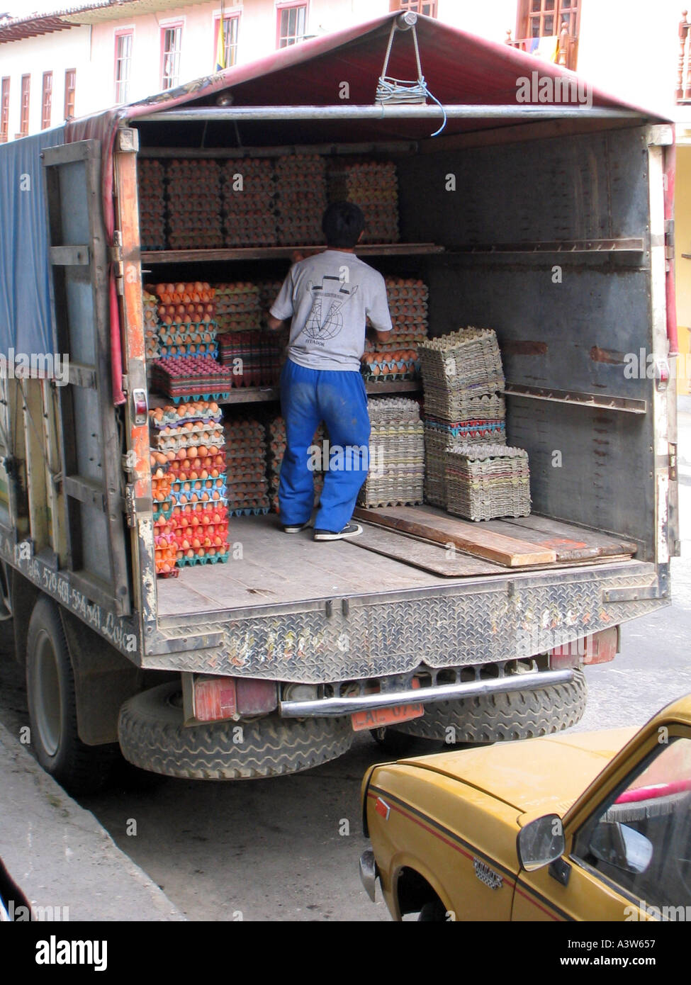 man on load floor of truck Stock Photo - Alamy