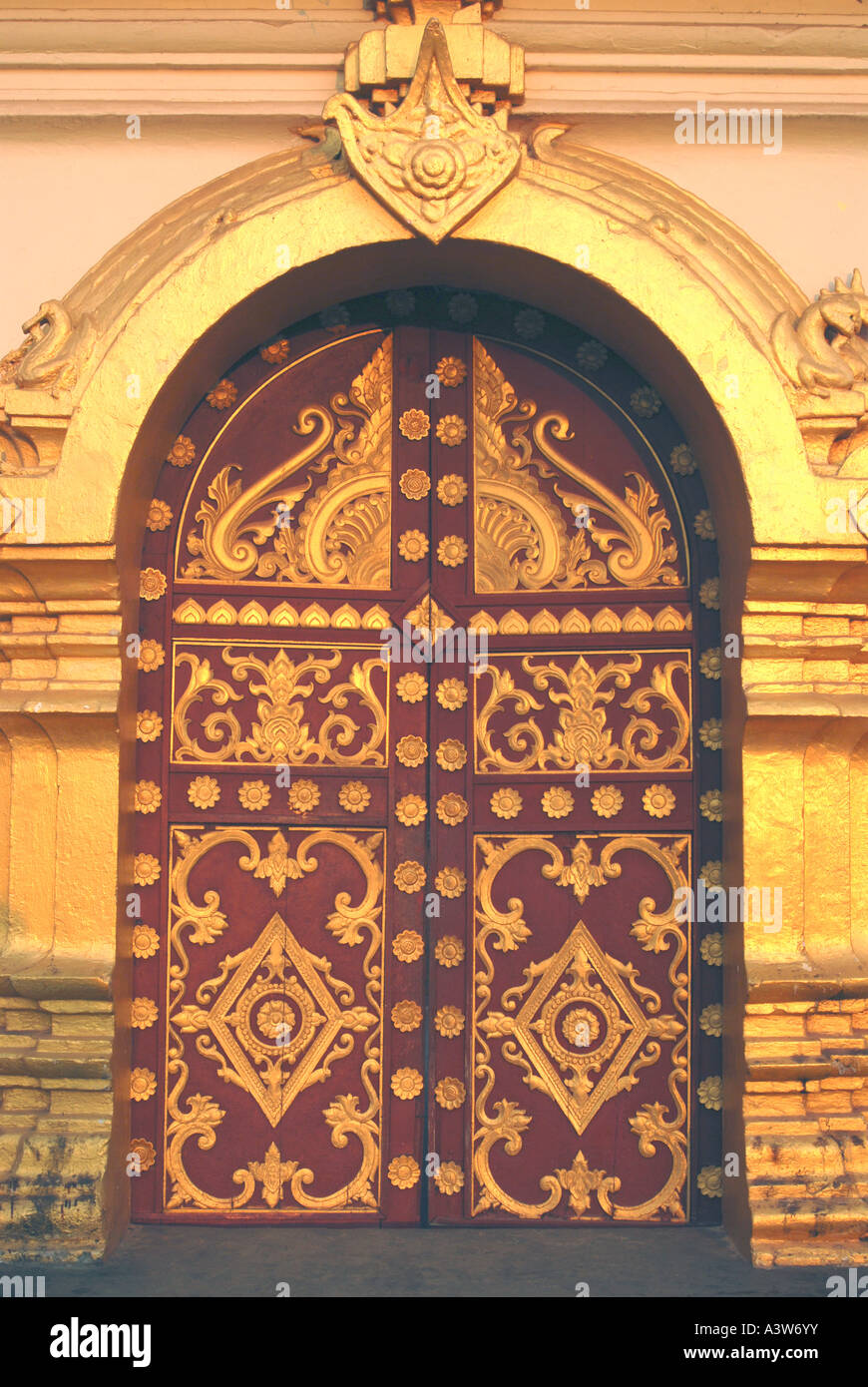 Entrance door to Pha That Luang, Vientiane, Laos Stock Photo - Alamy