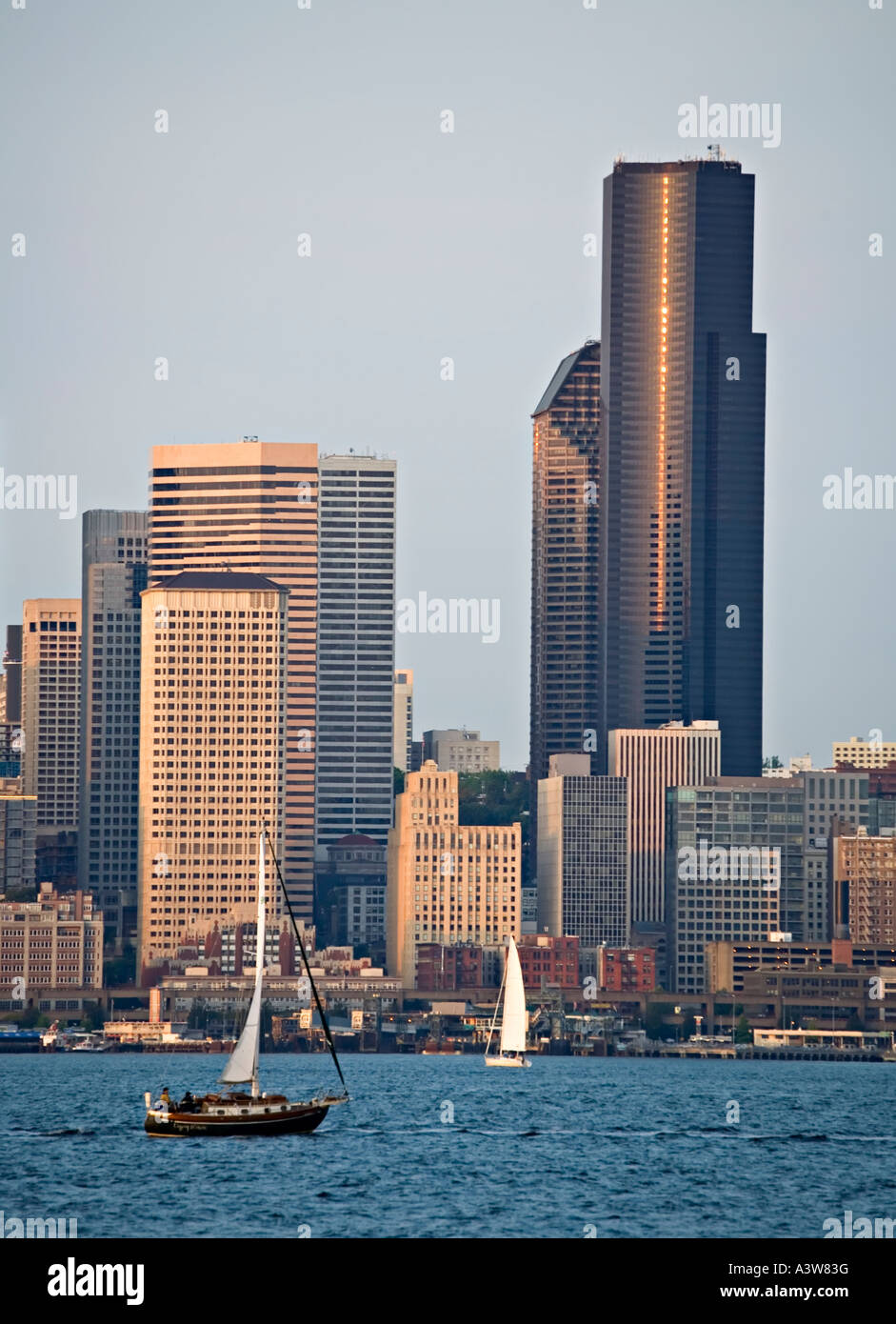 Yacht sailing in Puget Sound against backdrop of Seattle city ...