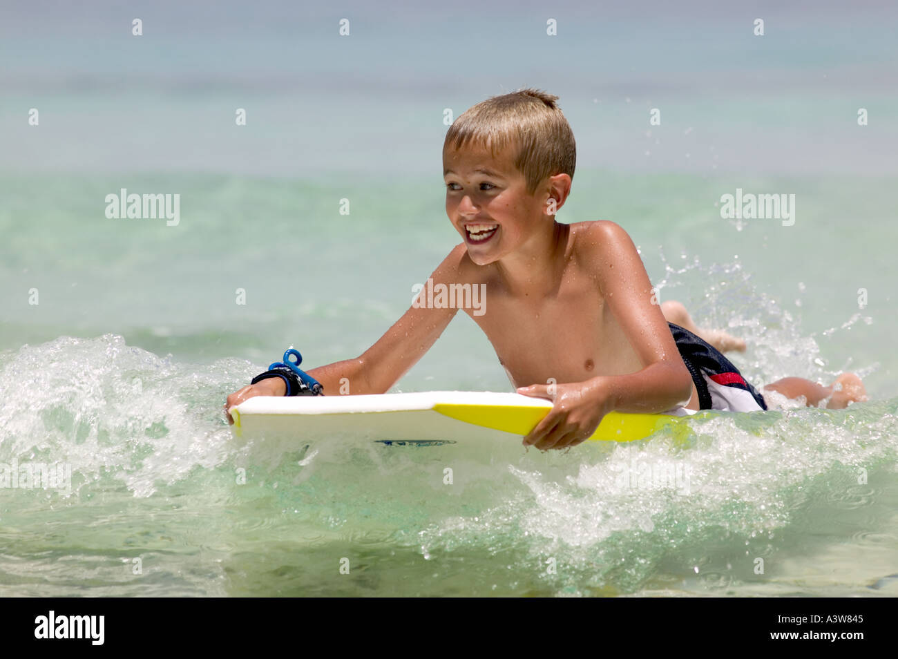 Child body boarding hi-res stock photography and images - Alamy