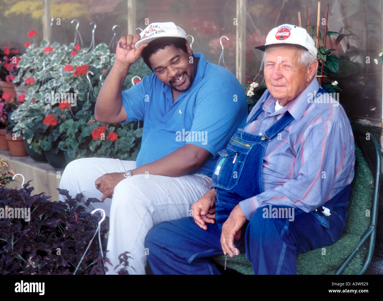 Old Friends neighbors and buddies working together for years Stock ...