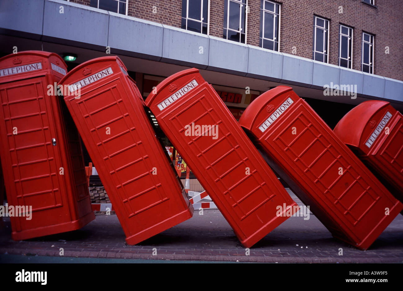 Out of Order - toppled telephone boxes sculpture in Old London Road ...