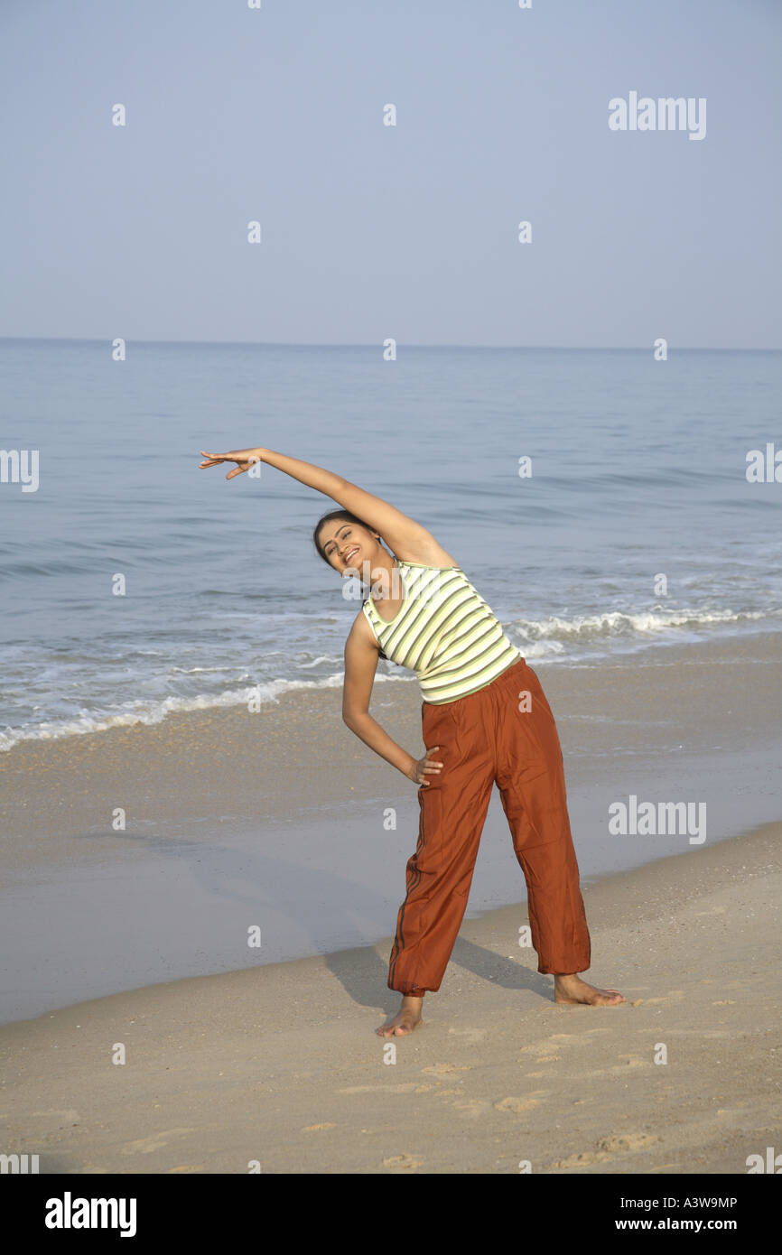 Indian lady yoga stretching hi-res stock photography and images - Alamy