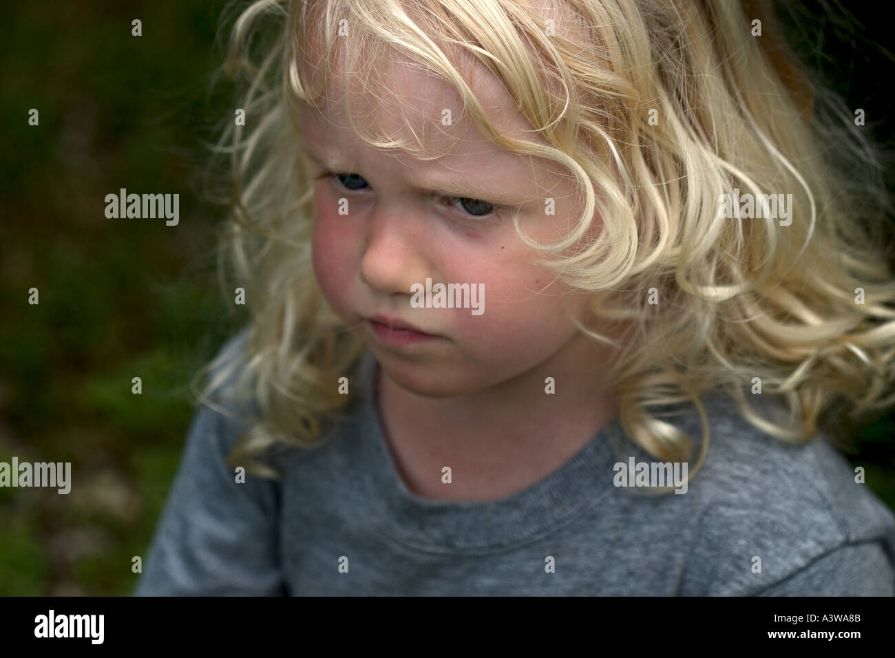 Angry Blonde Girl Stock Photo - Alamy