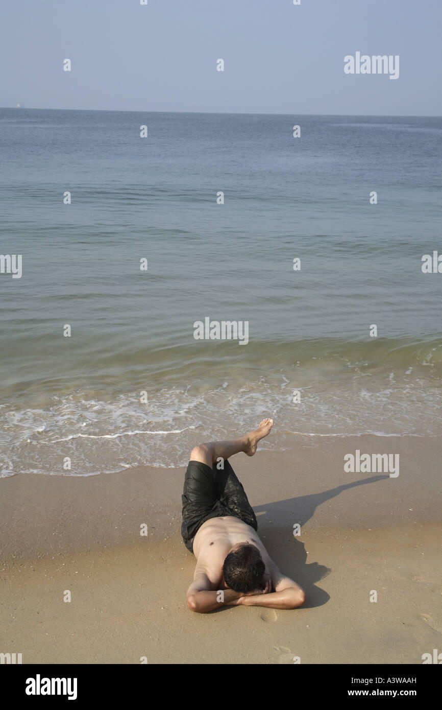 Bachelor on holiday relaxing enjoying on the beach sun sand sea Stock ...