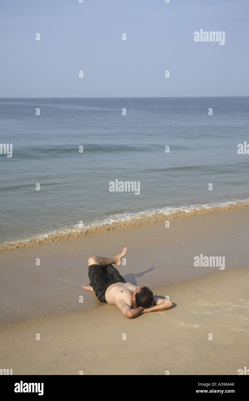 Bachelor on holiday relaxing enjoying on the beach sun sand sea Stock ...