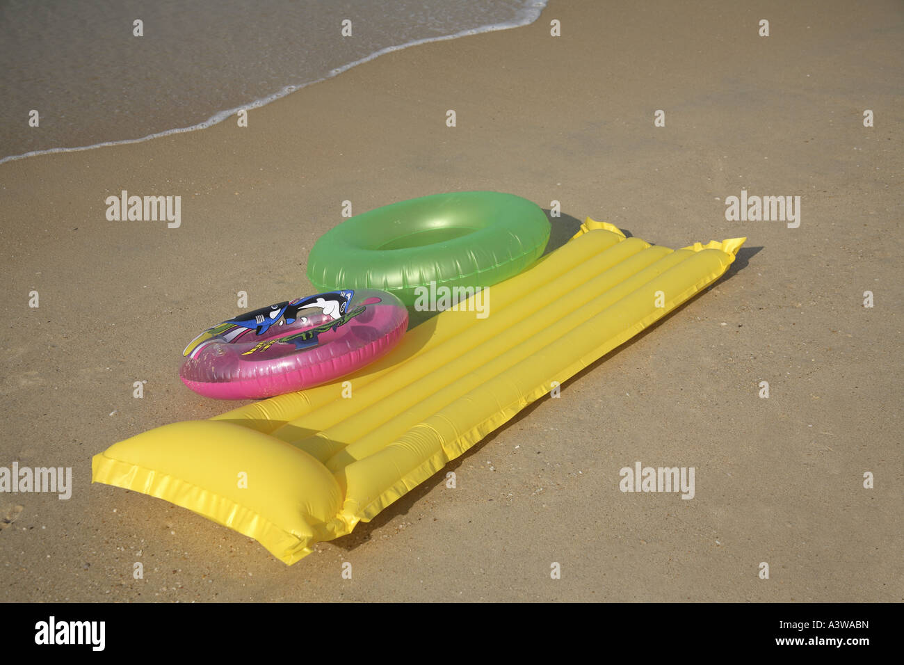 Plastic floats bed on beach Stock Photo - Alamy