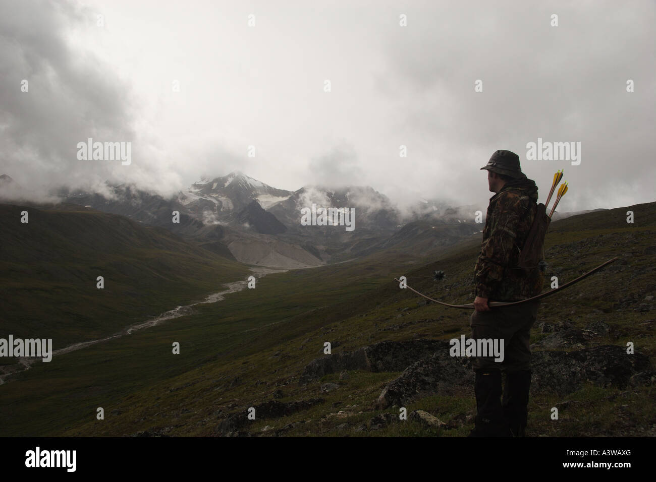 Man hunting with bow and arrow hi-res stock photography and images - Alamy