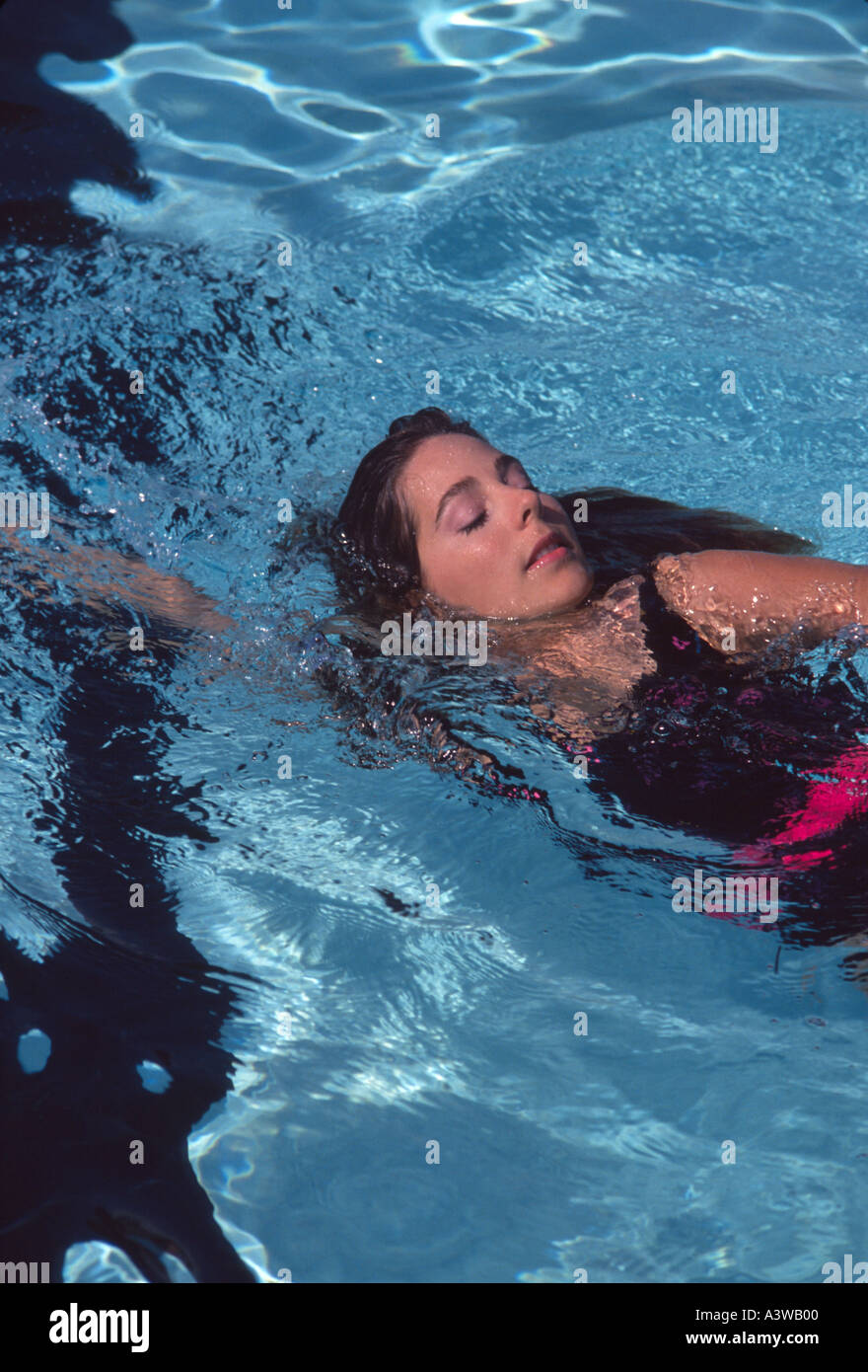 woman swimming in pool recreational or lap swim sidestroke side stroke ...