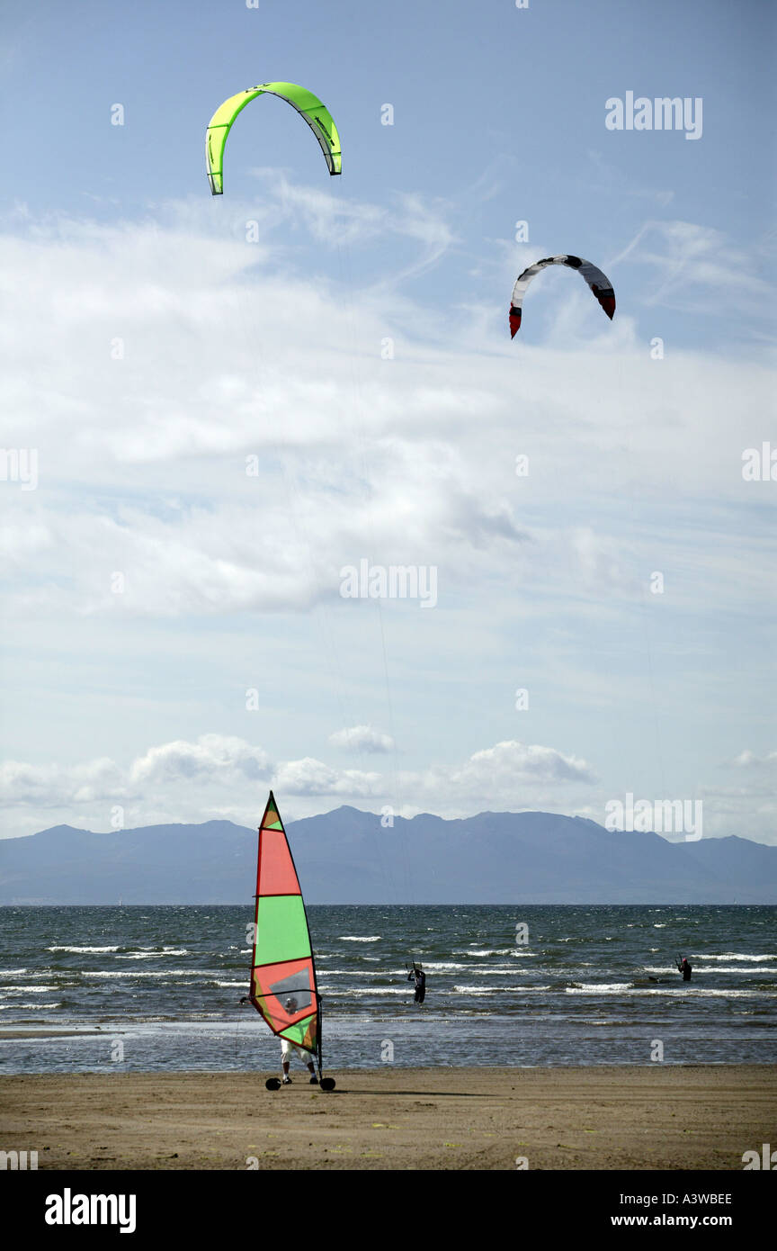Seaside water sport of Kite Surfing at Troon Scotland with the Isle of ...