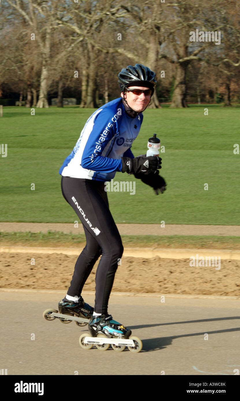 Man rollerblading in Hyde Park London Stock Photo - Alamy